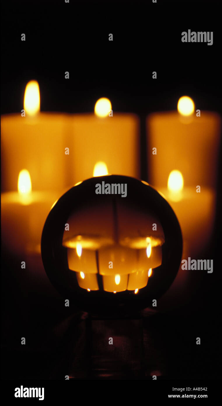 Cristal ball and candles Stock Photo - Alamy