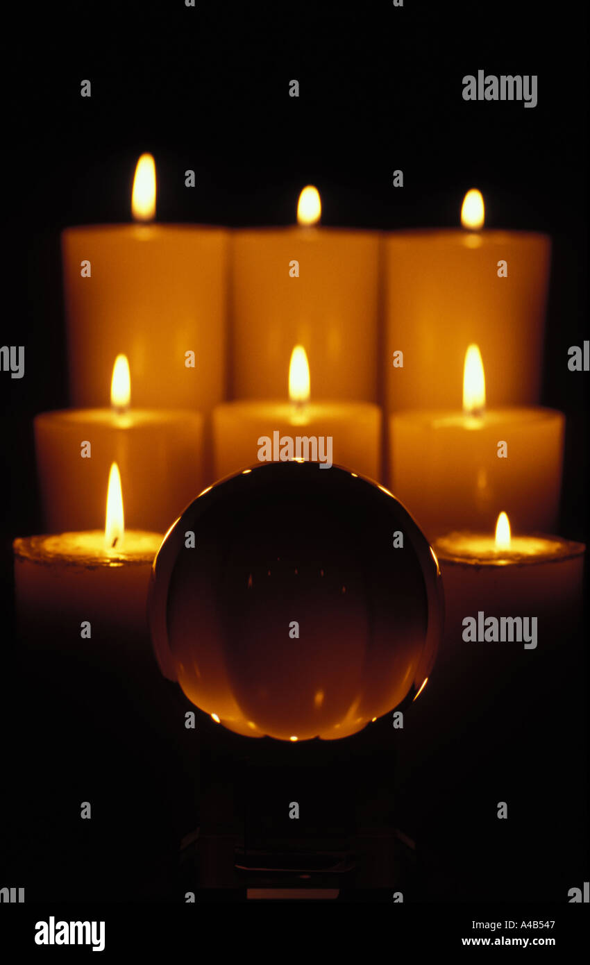 Crystal ball and candles Stock Photo - Alamy