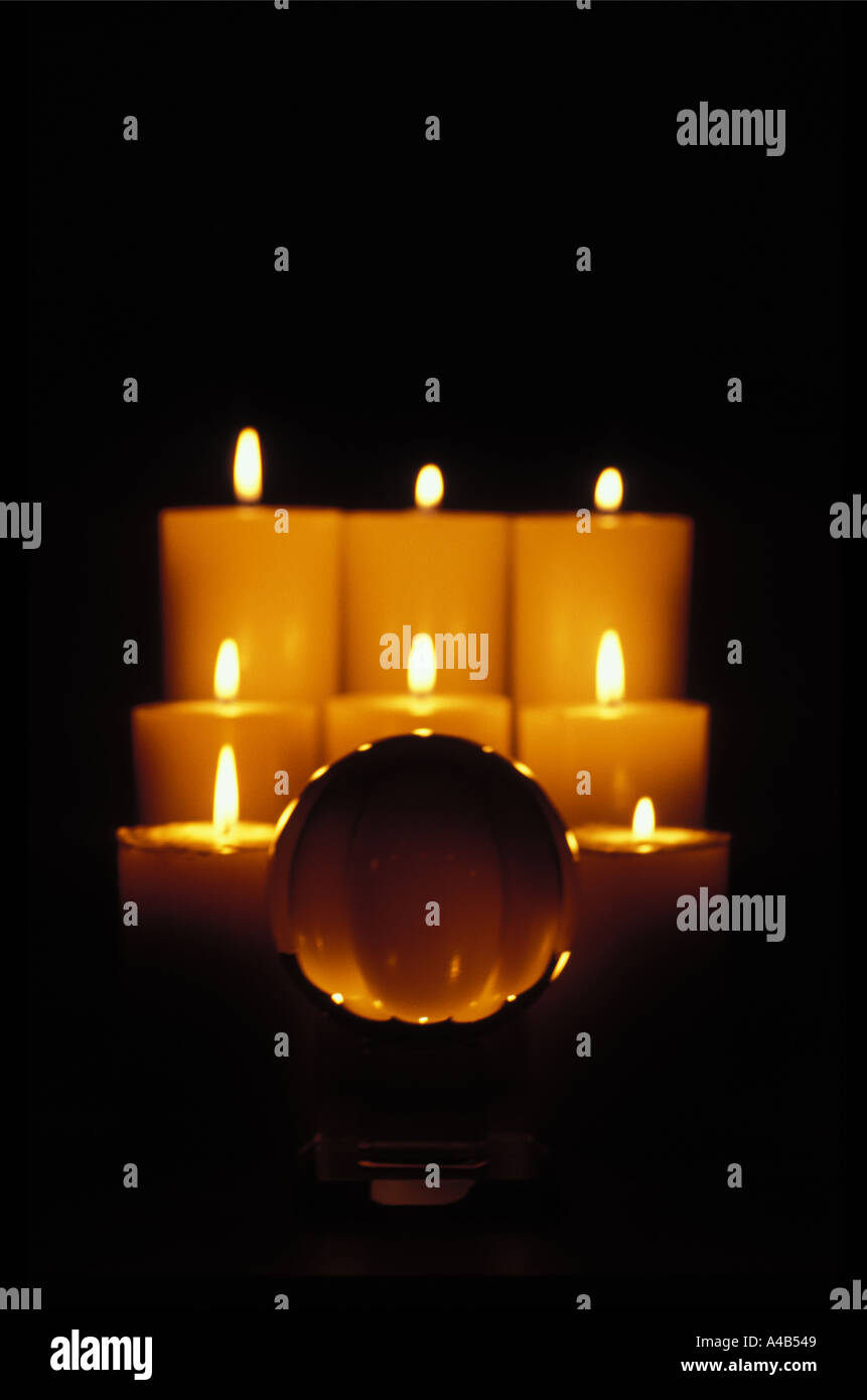 Crystal ball and candles Stock Photo - Alamy