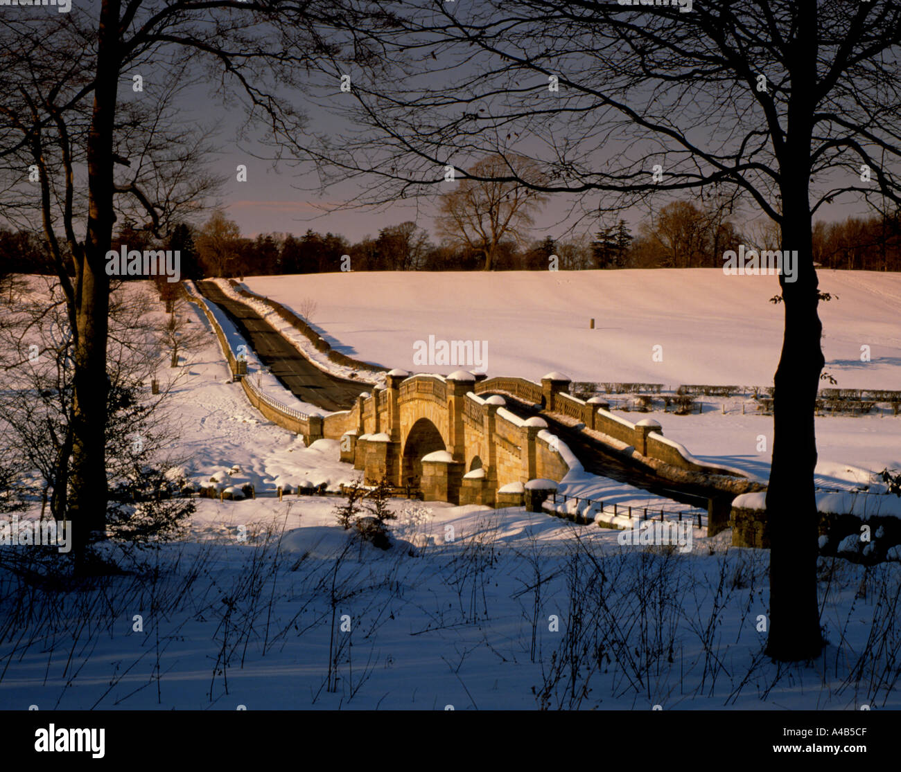 Country road and bridge in winter, Bridge over River Wansbeck near ...