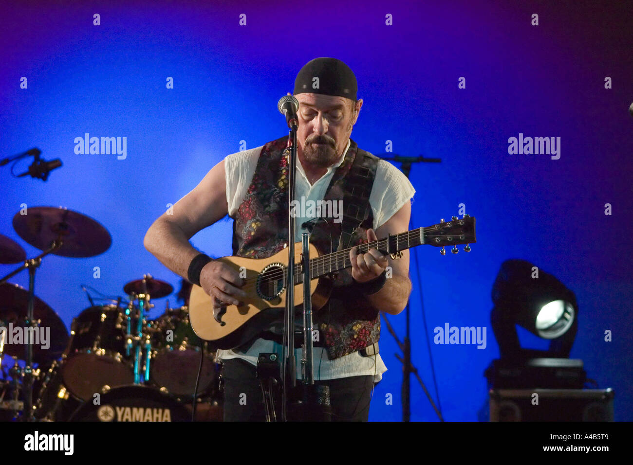 Ian Anderson of Jethro Tull playing the banjo at a gig Stock Photo - Alamy