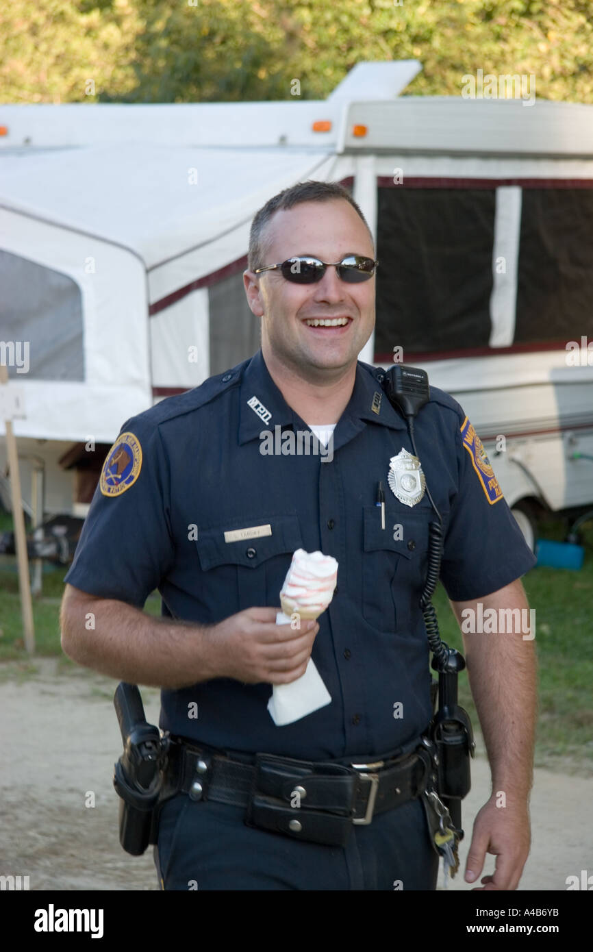 Policeman with an ice cream cone Stock Photo - Alamy