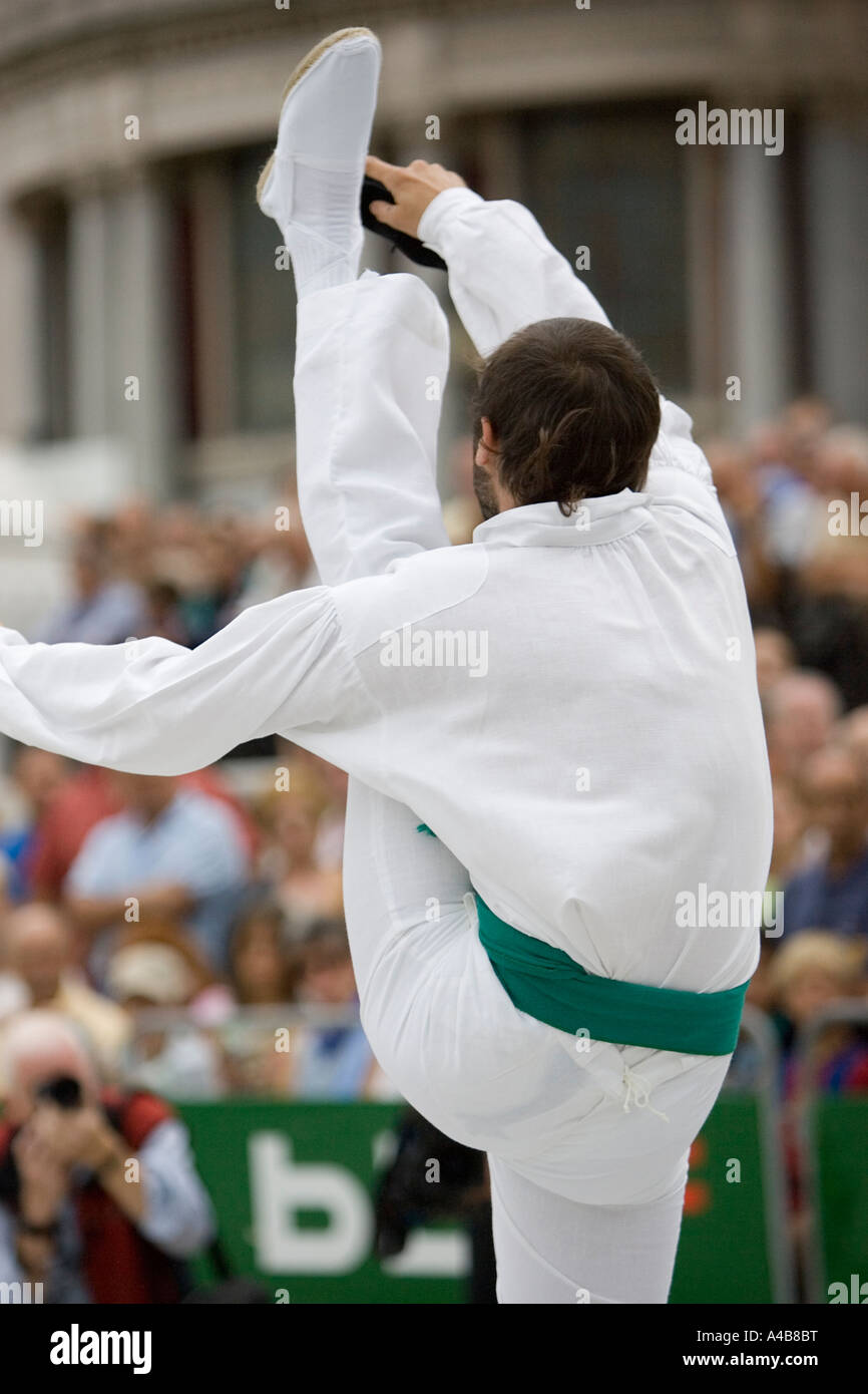 Man performing traditional Basque welcoming dance, Basque Strongman ...