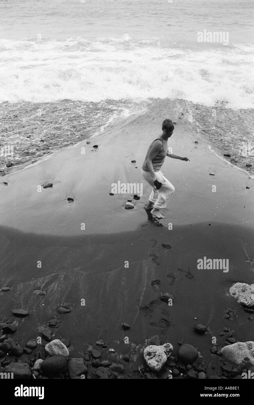 Running into surf Black and White Stock Photos & Images - Alamy