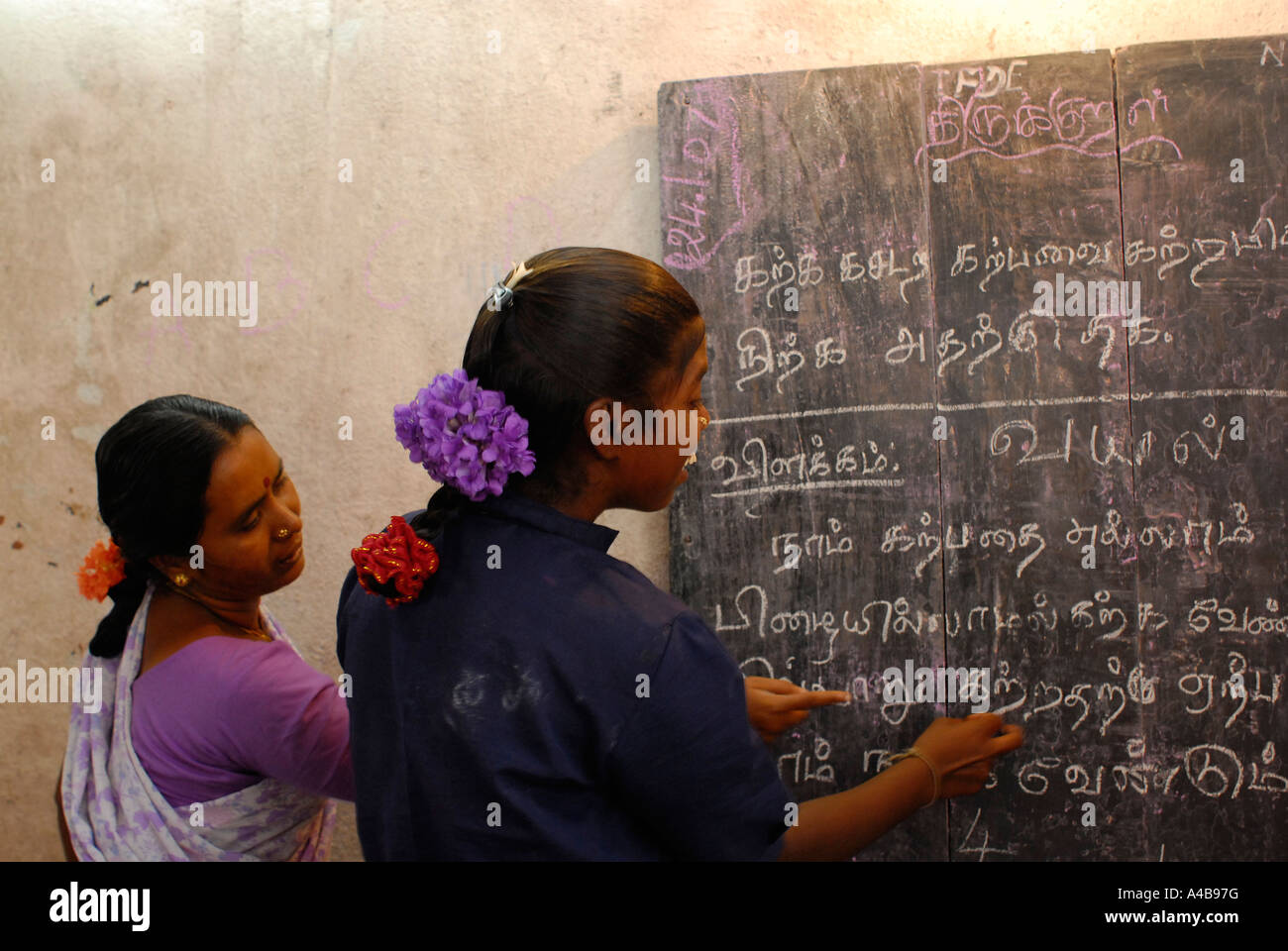 Stock image of Indian tribal village school children at blackboard with ...