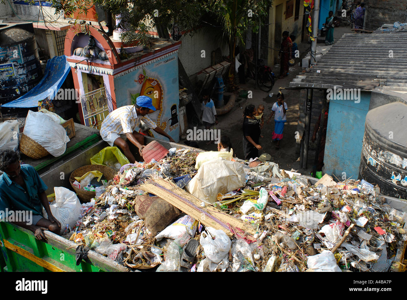 Stock image of garbage collection in Chennai slum Tamil Nadu India ...