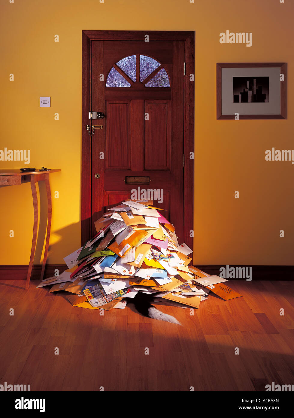 Home front door with a pile of junk mail Stock Photo - Alamy