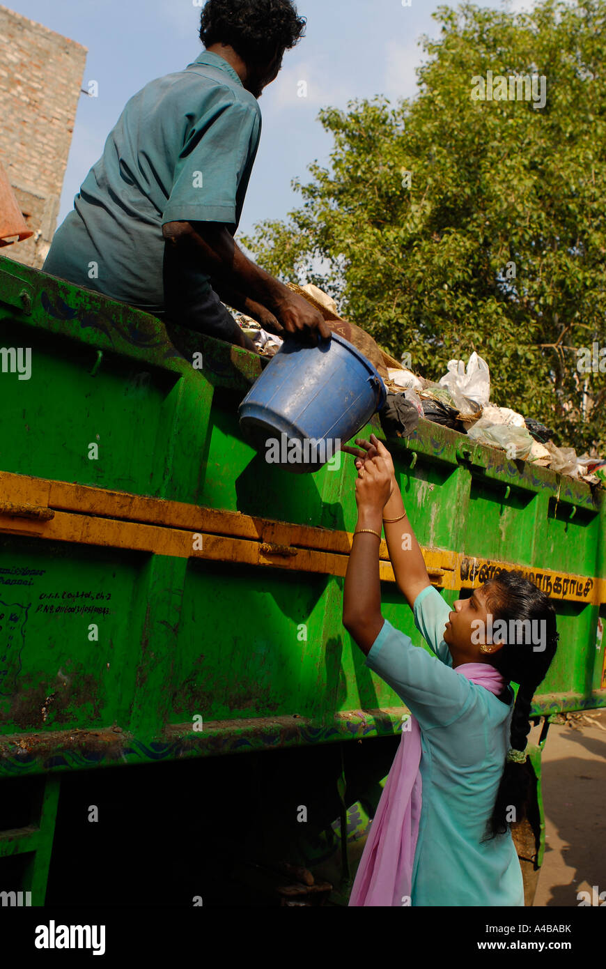 Stock image of garbage collection in Chennai slum Tamil Nadu India ...