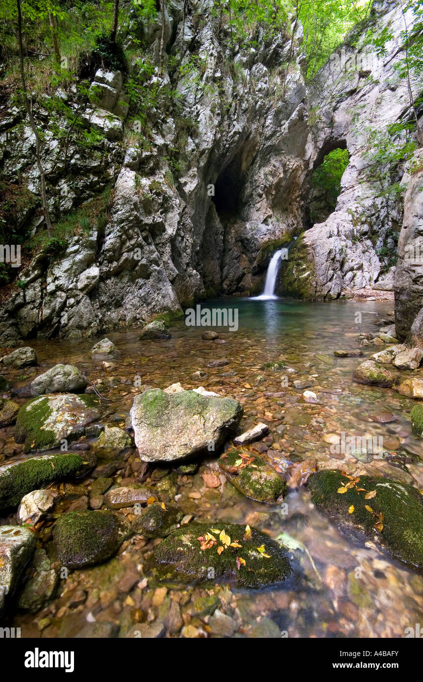 spectacular waterfall from a hole in the rocks Stock Photo - Alamy