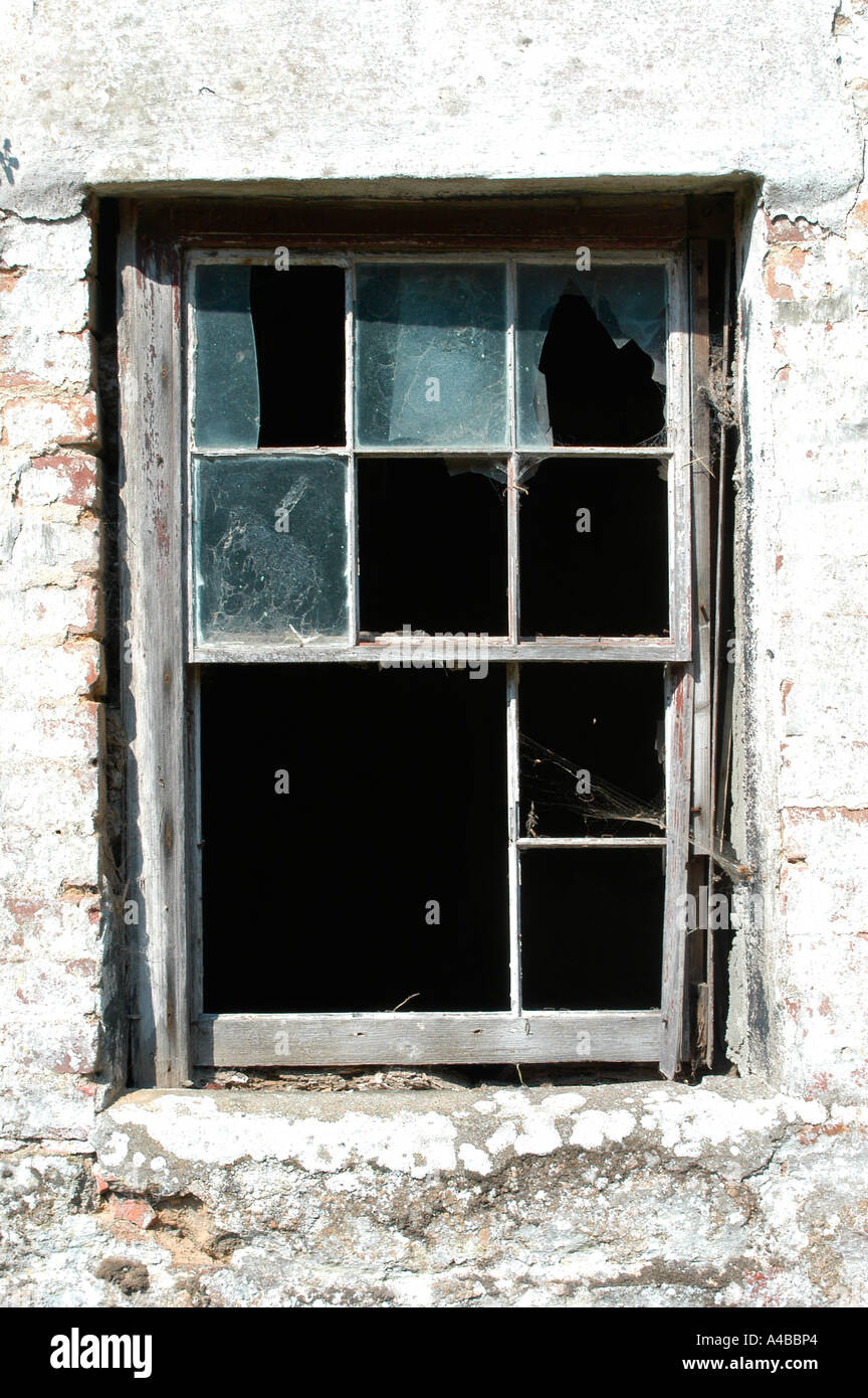 Broken window in white wall Stock Photo - Alamy