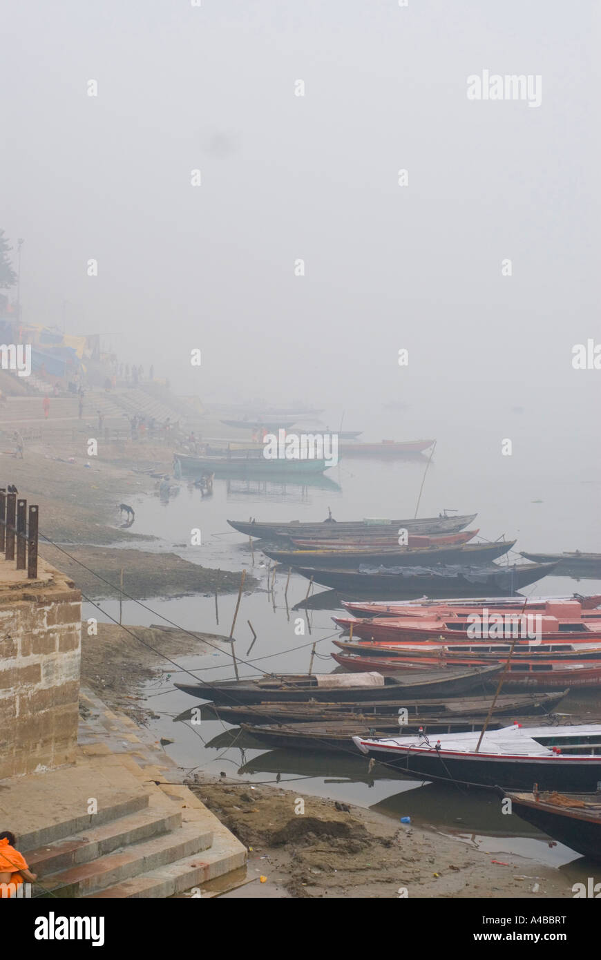 Stock image of boats and bathers along the ghats and steps of the River ...