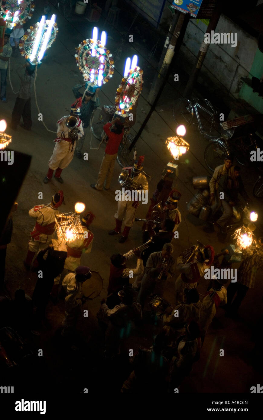 Stock image of night time Hindu wedding procession through the streets ...