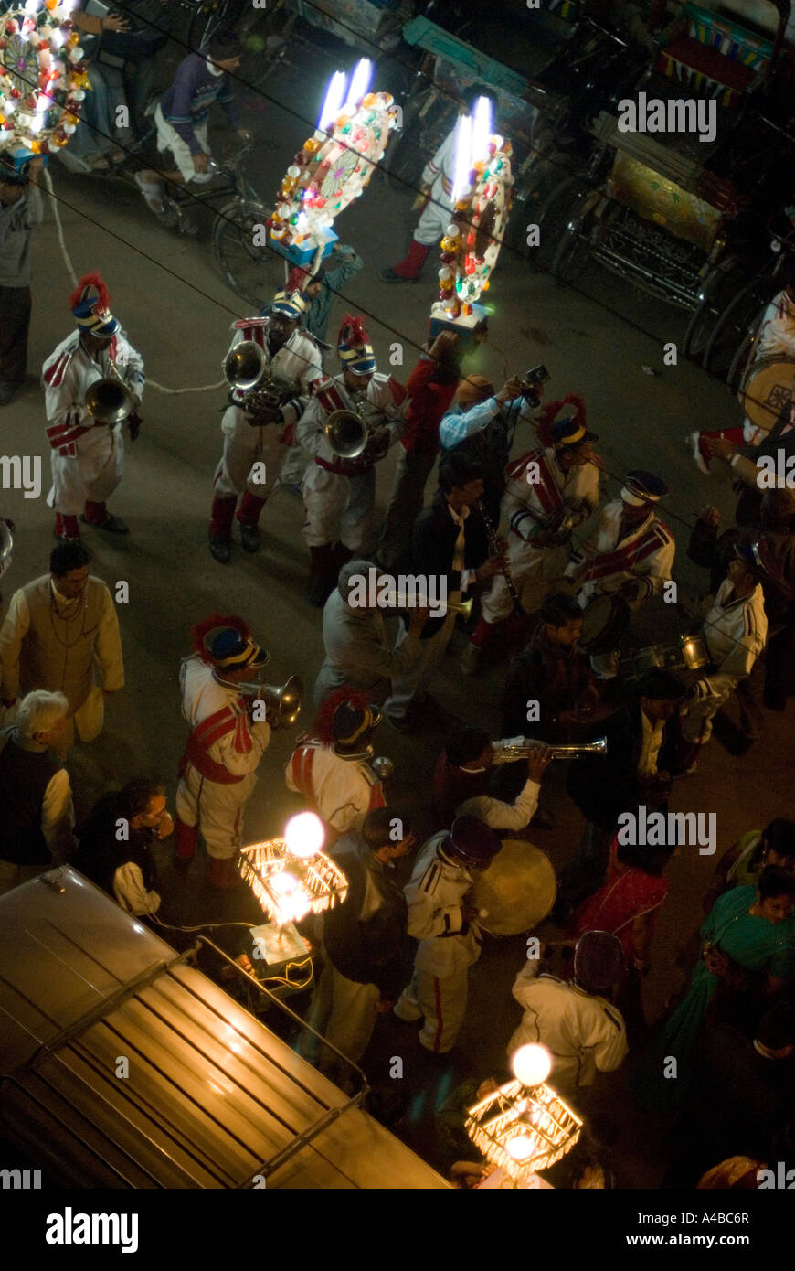 Stock image of night time Hindu wedding procession through the streets ...