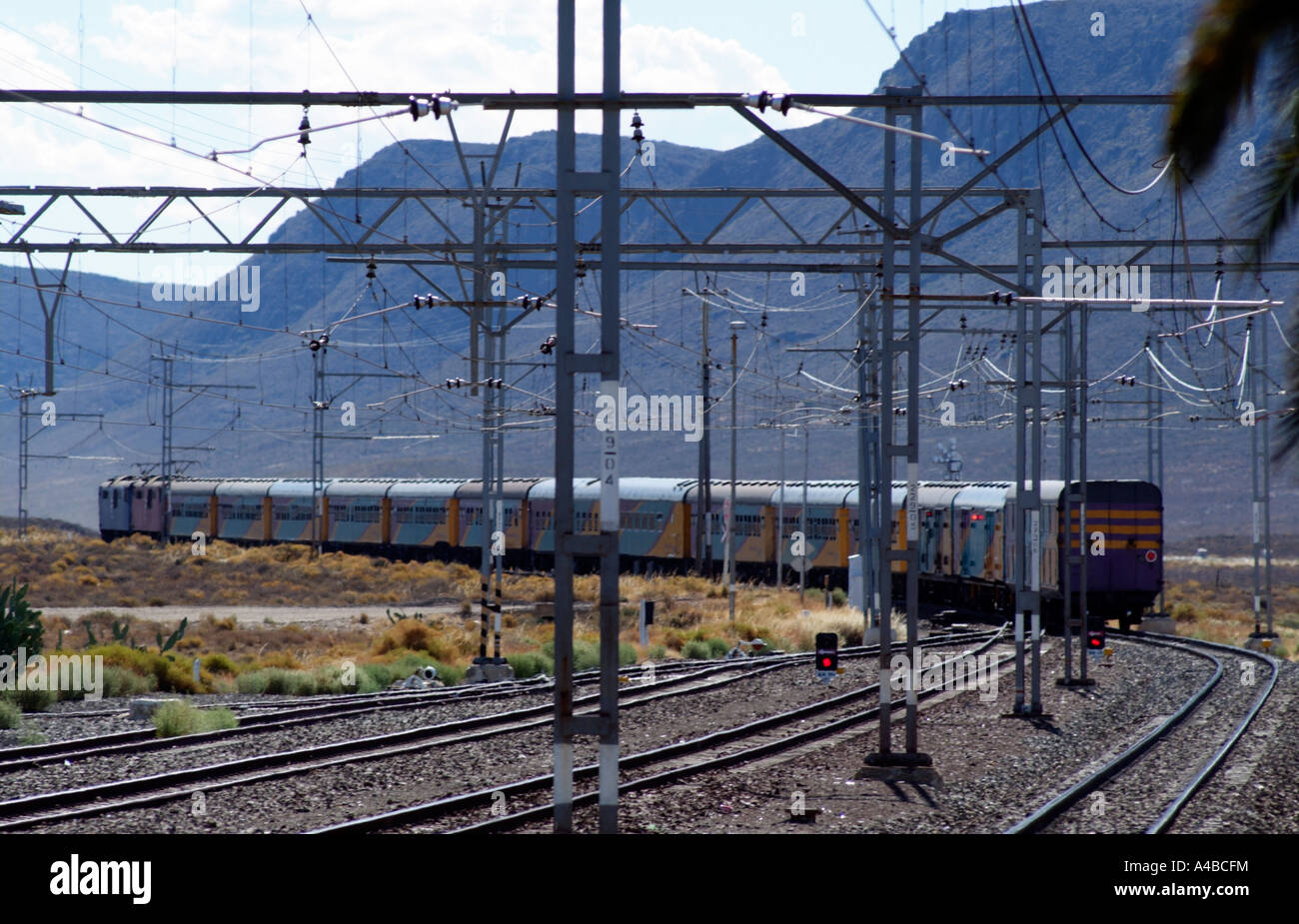 Electric powered railway train departing Matjiesfontein heading south ...