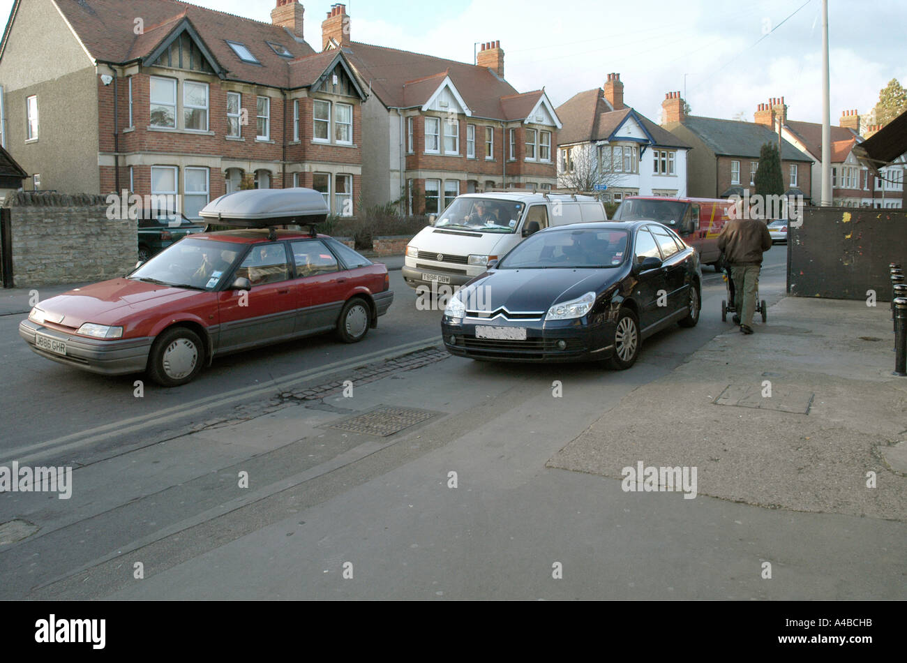 car parked on the pavement causing obstruction Stock Photo - Alamy