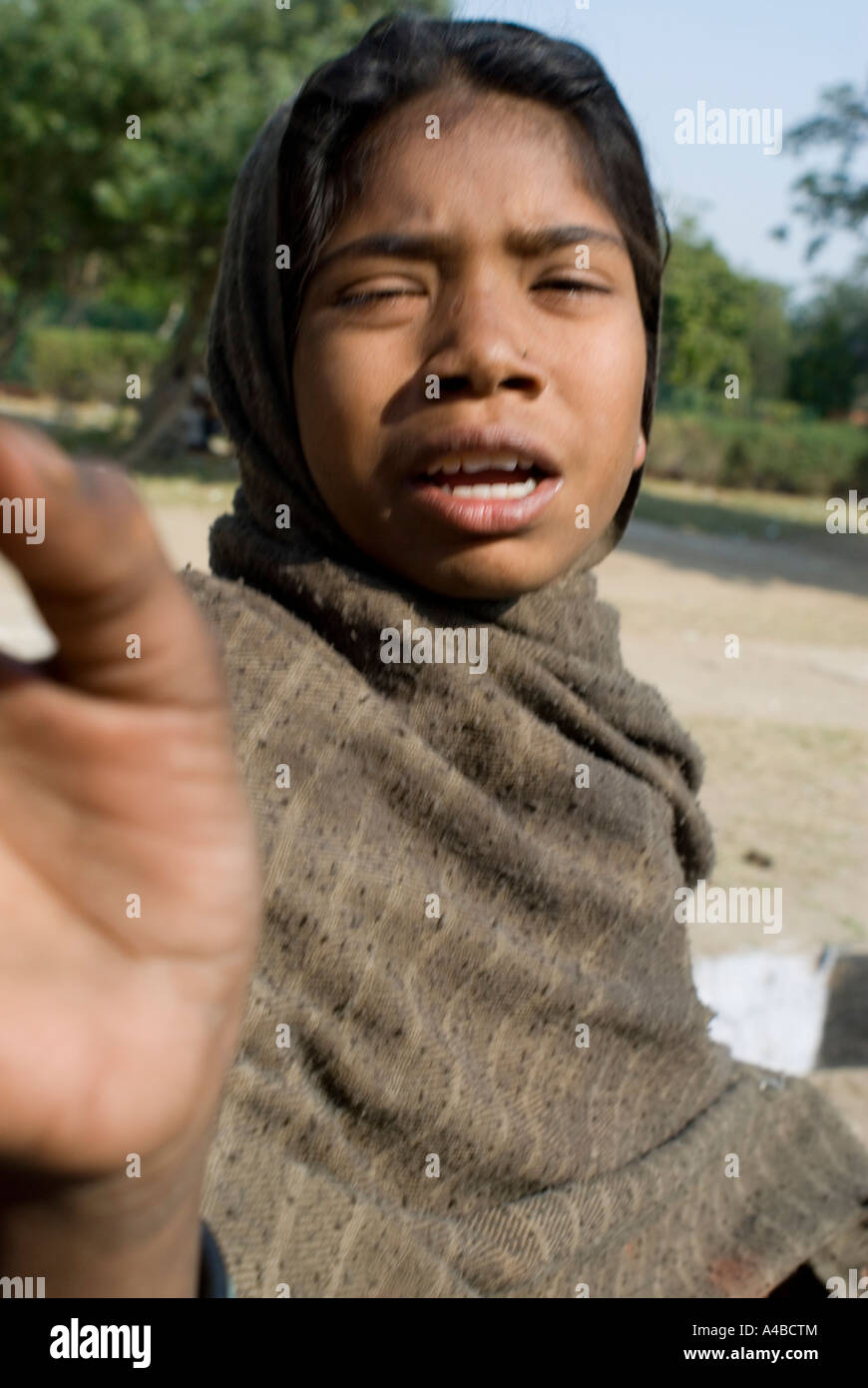 Child begging hi-res stock photography and images - Alamy