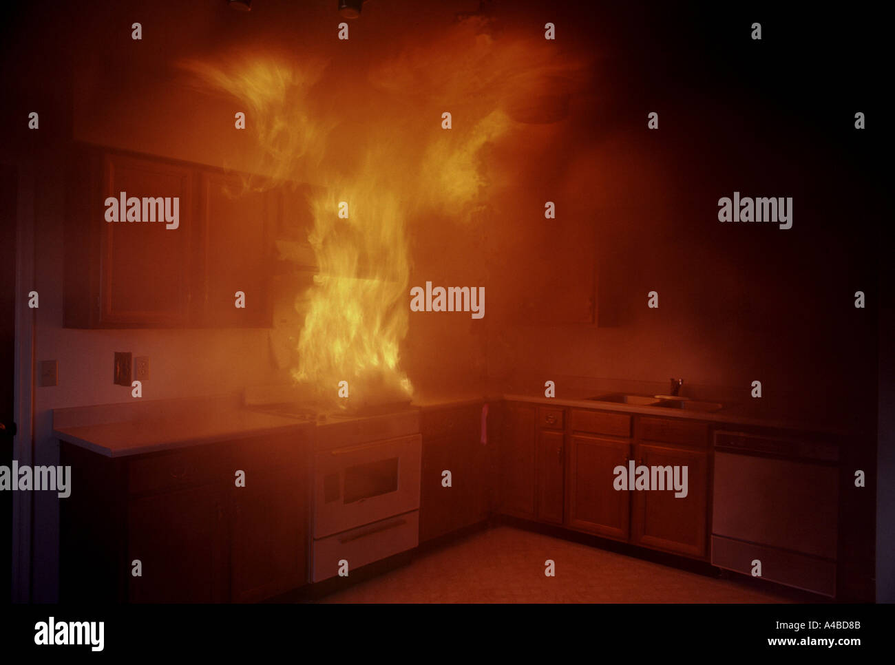 Fire in house kitchen Stock Photo - Alamy