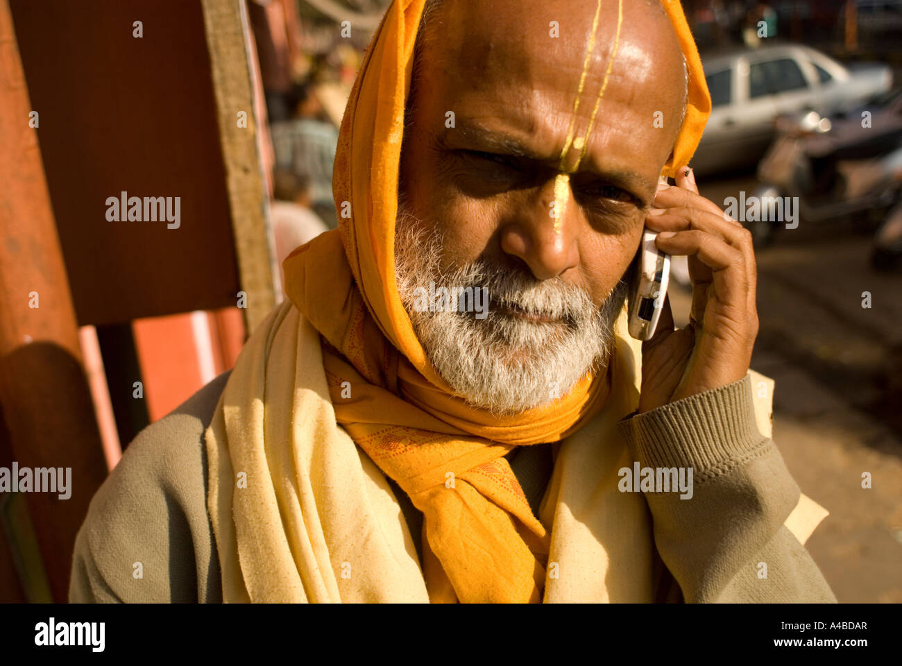 Priest on phone hi-res stock photography and images - Alamy