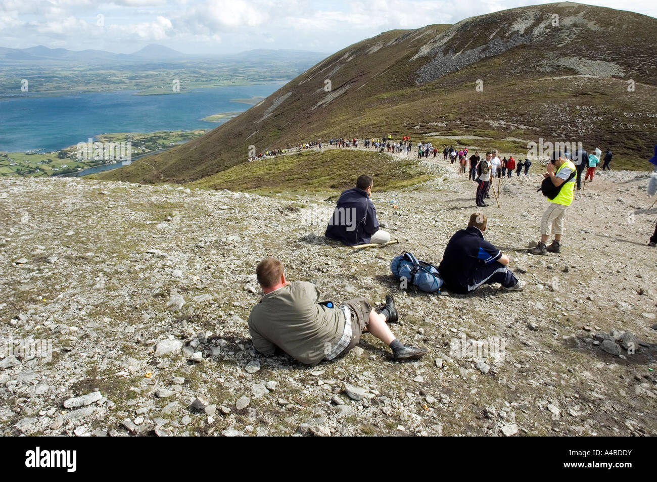 Pilgrims take a rest at Croagh Patrick, County Mayo, Ireland Stock ...