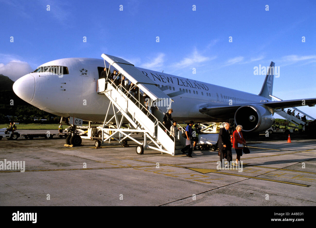 Cook Islands Rarotonga Airport and passengers disembarking an Air New ...