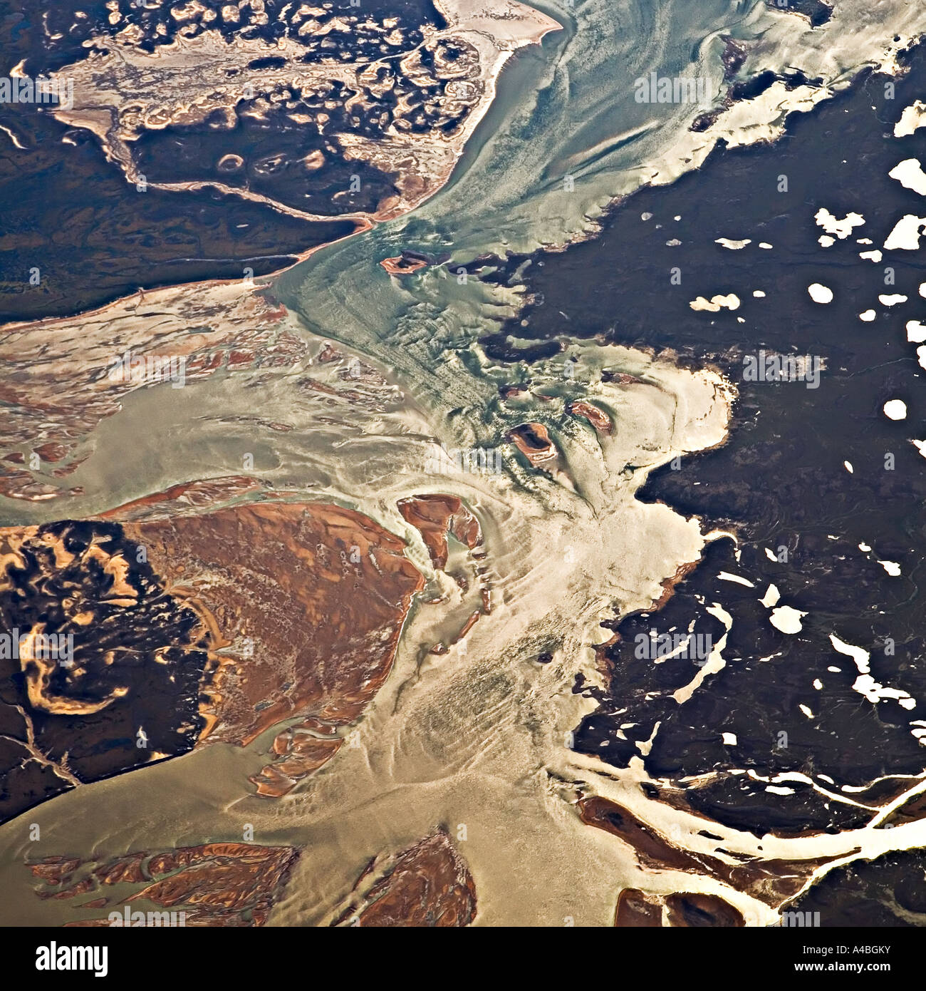 Snowy wasteland and mountains from air northern Canada Stock Photo - Alamy