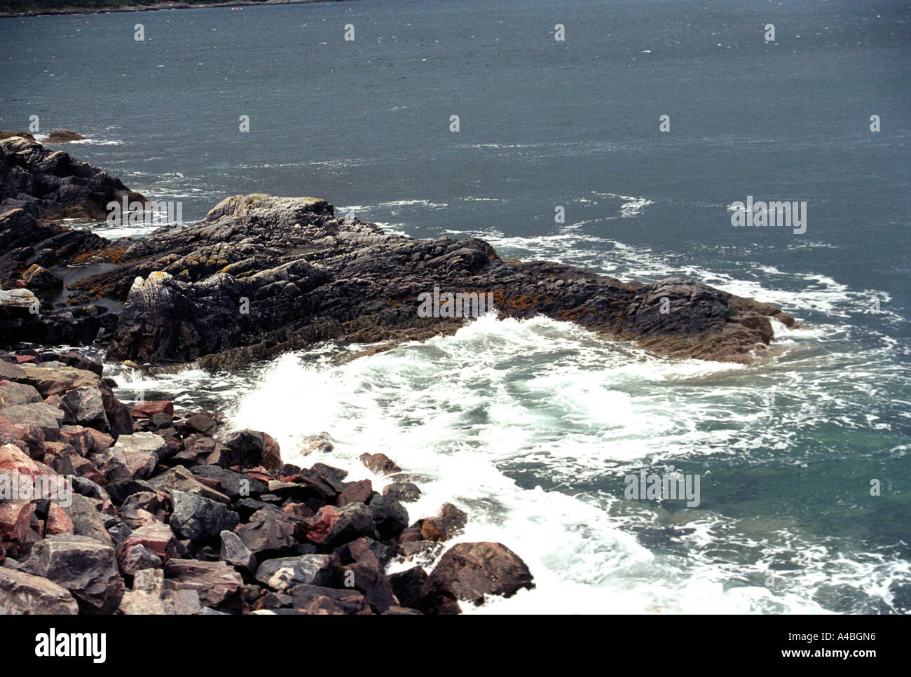 WAVES AND ROCKS Stock Photo - Alamy