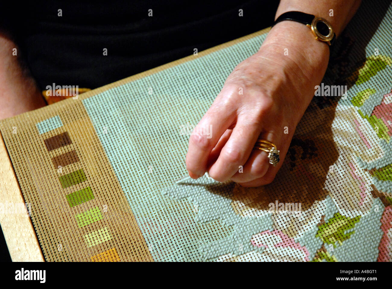 Woman sewing tapestry hi-res stock photography and images - Alamy