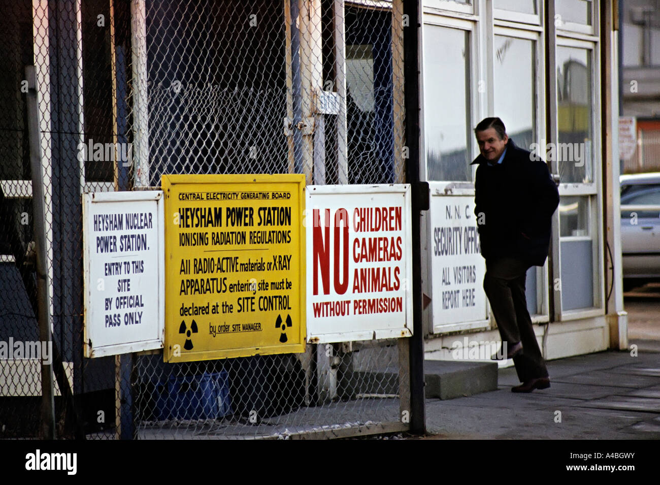 Entrance to Nuclear Power Station with warning signs Heysham Lancashire ...