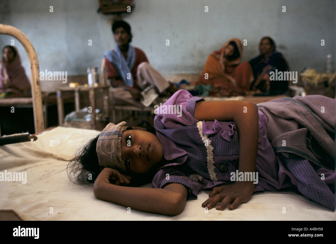 Orissa Cyclone, India, 1999 : a young girl suffers from diarrhoeal ...