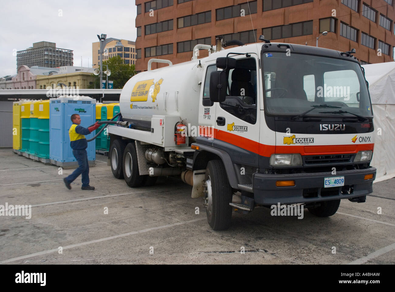 A pump truck pumping out portable toilets at a festival in Hobart ...