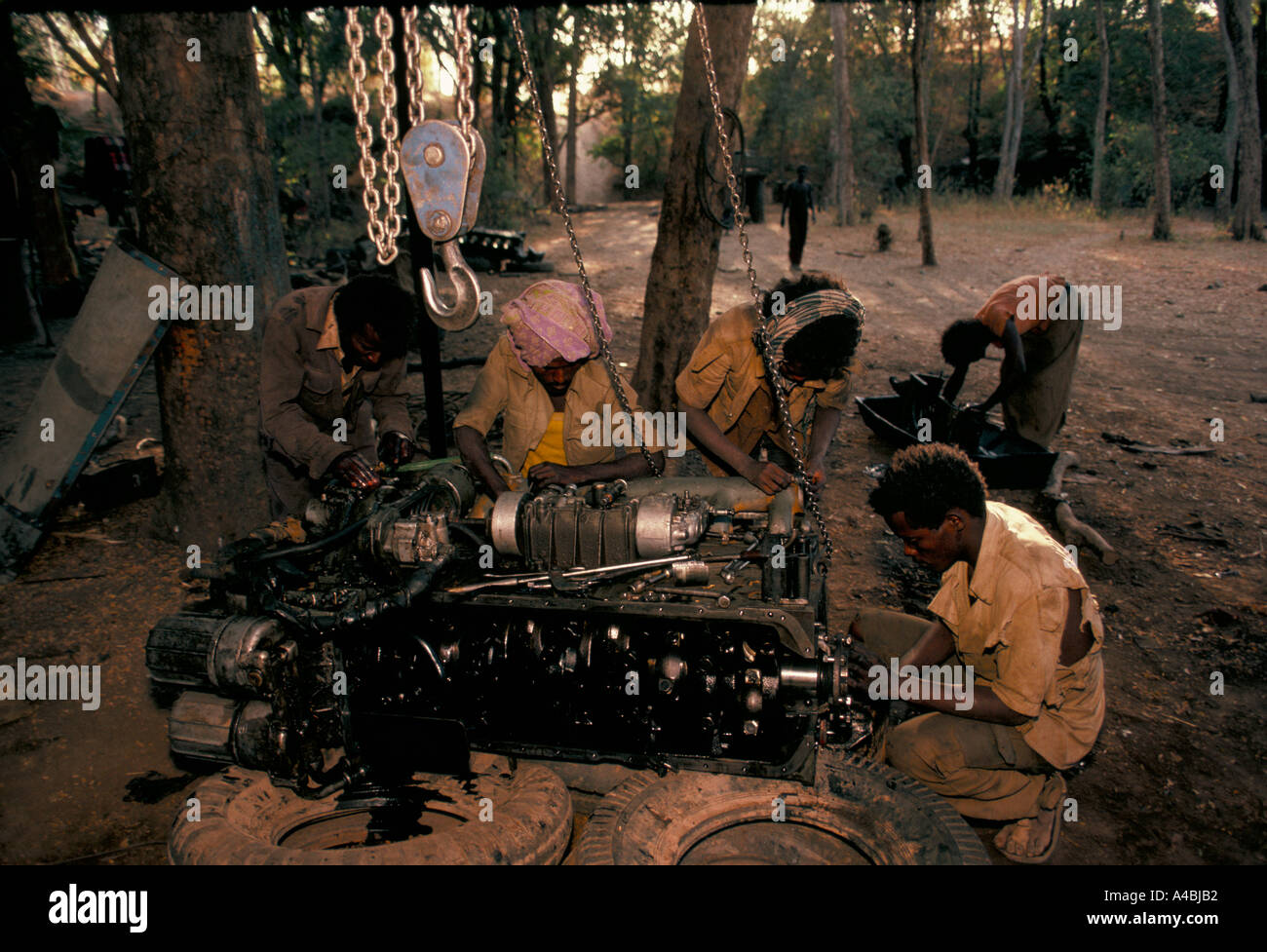 men repairing engine technical training workshops tigray Stock Photo ...