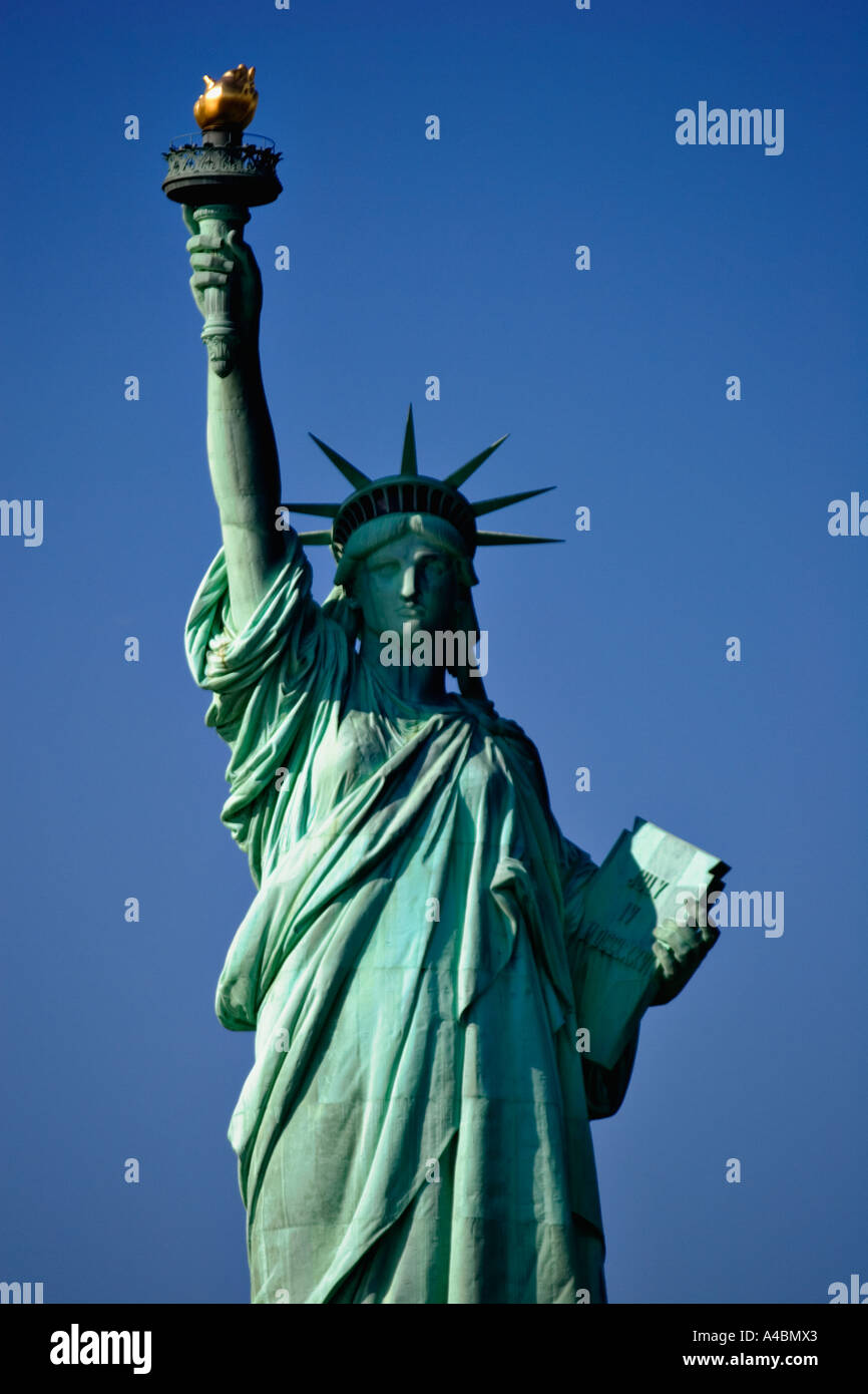 Statue of Liberty standing tall in New York s harbor designed by French ...