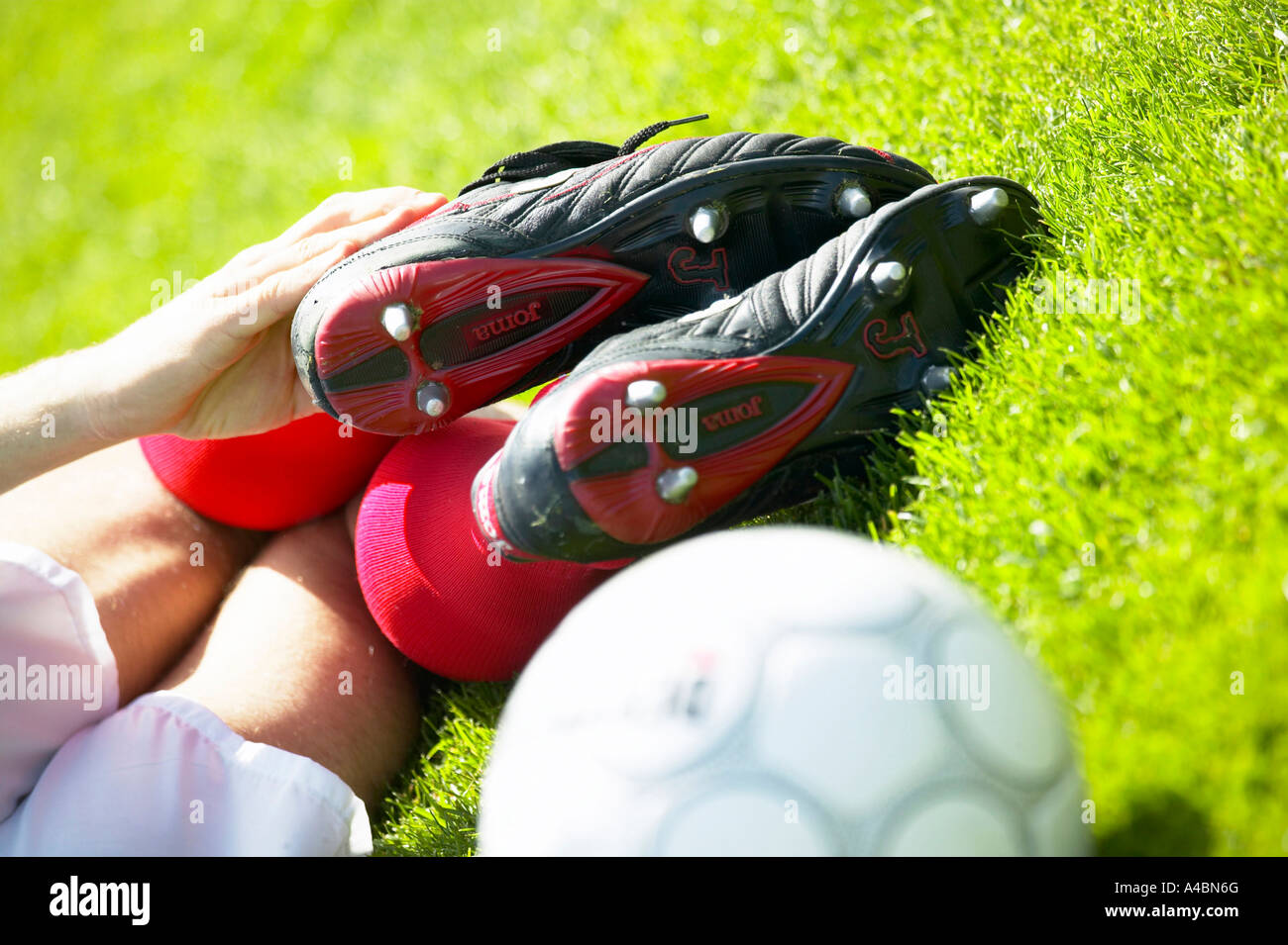 Football pain floor lie injury hi-res stock photography and images - Alamy