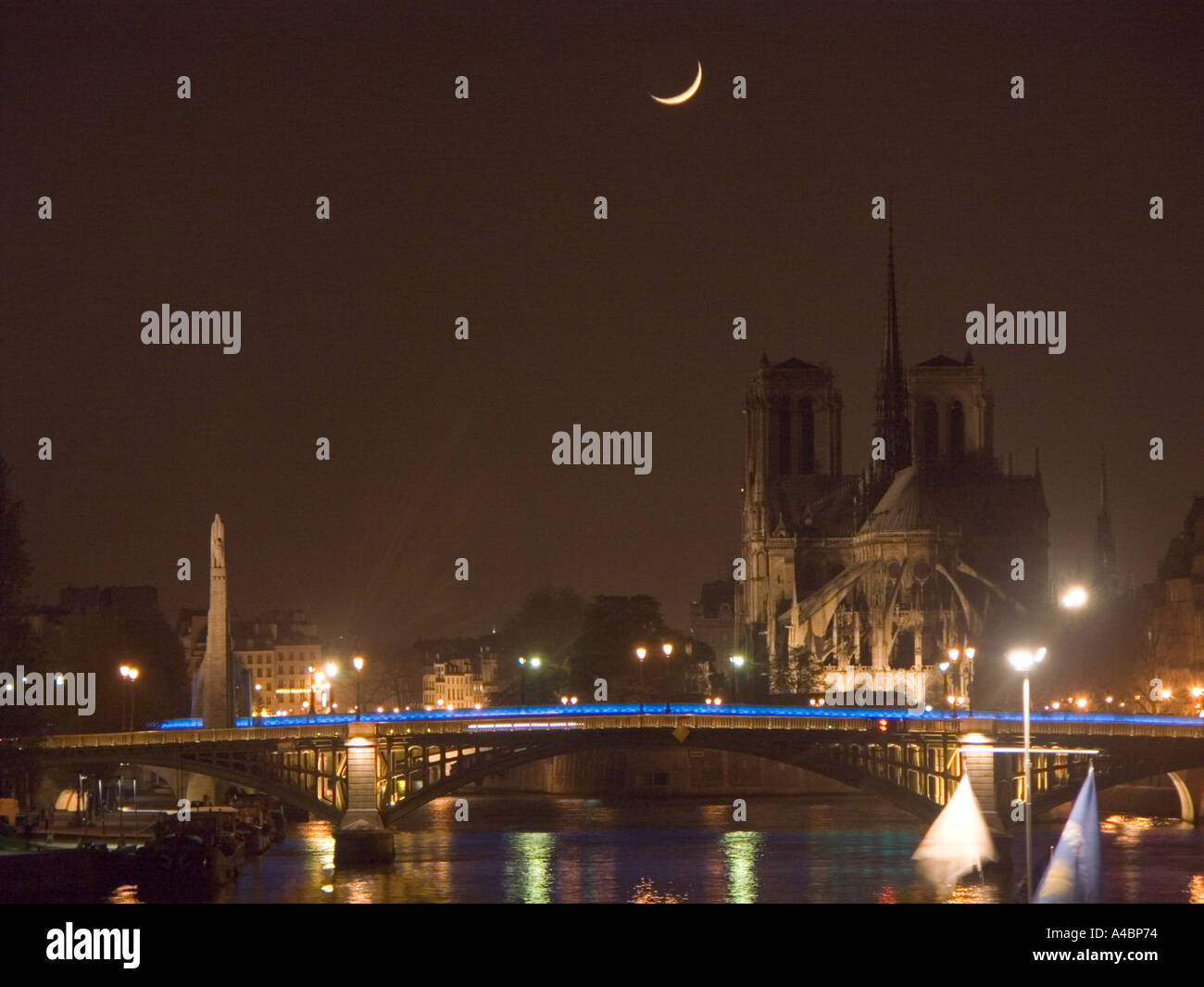 Notre Dame Paris by night with moon Stock Photo - Alamy