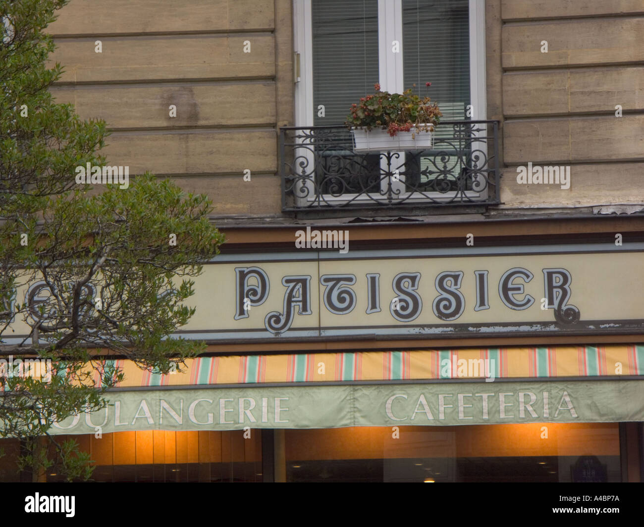 Patissier shop sign for bakery confectioner in Paris France Stock Photo ...