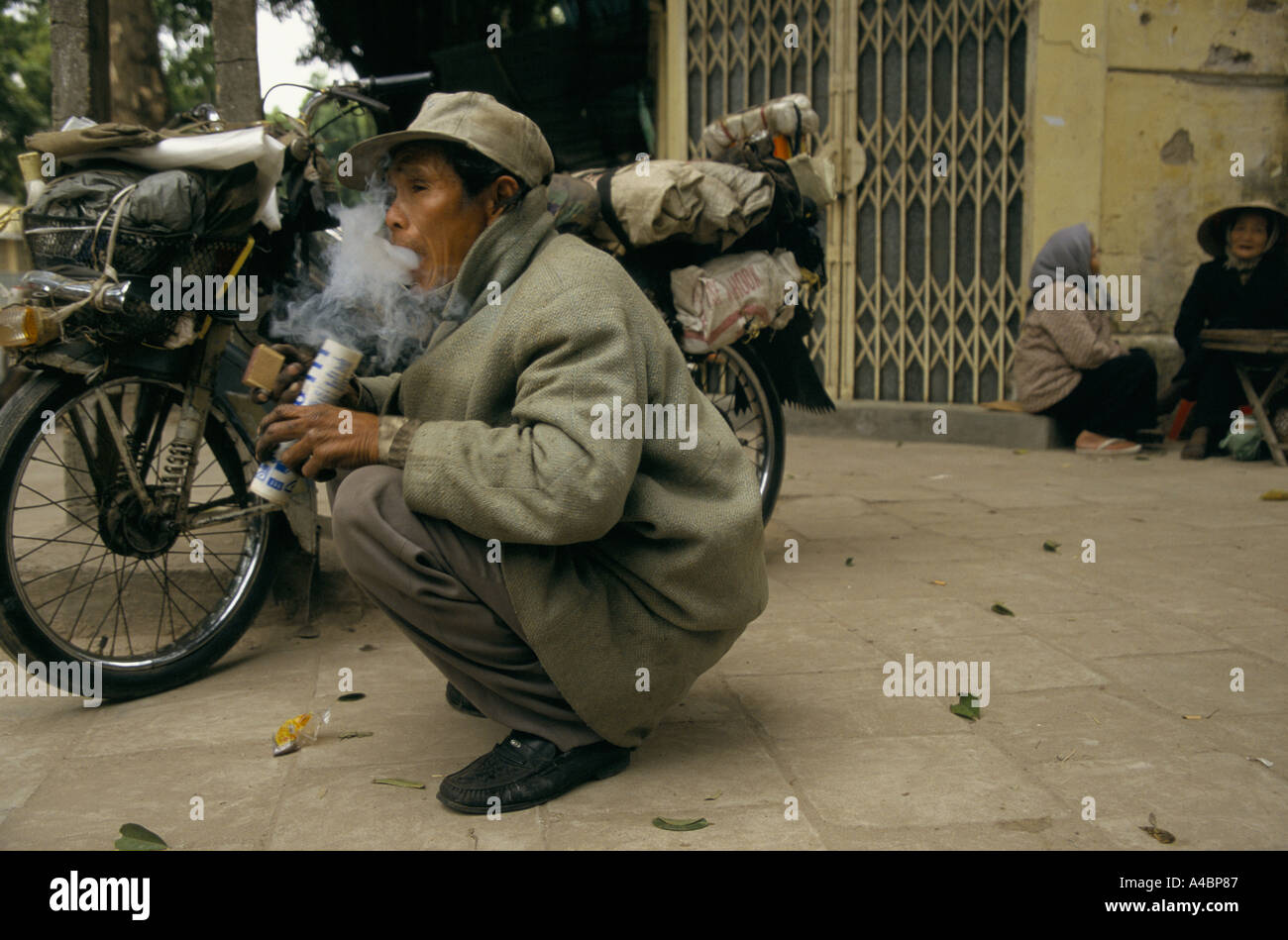 vietnam streets hanoi north vietnam motorcyclist smoking 1995 Stock ...