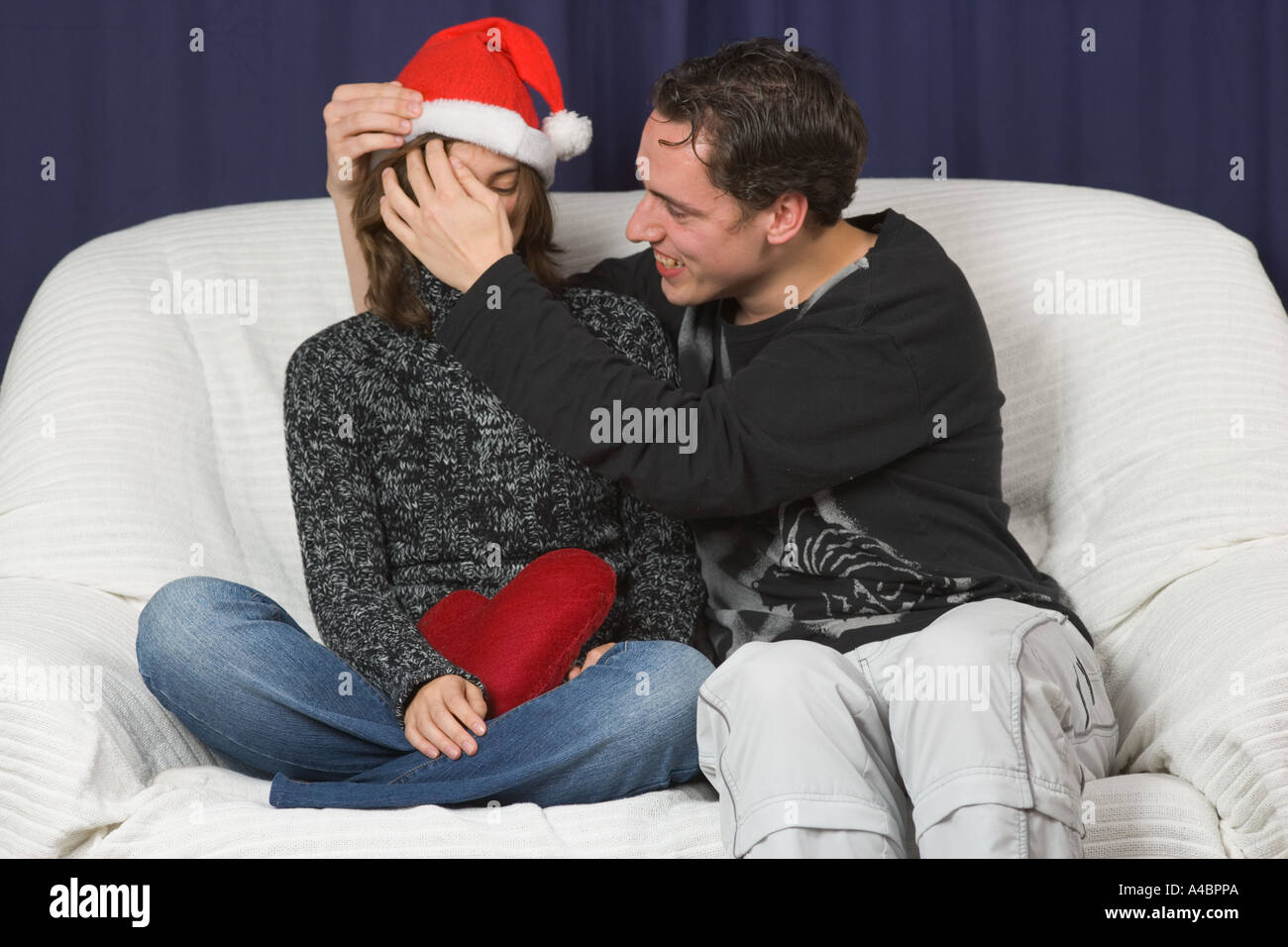 Woman putting red cap on hi-res stock photography and images - Alamy