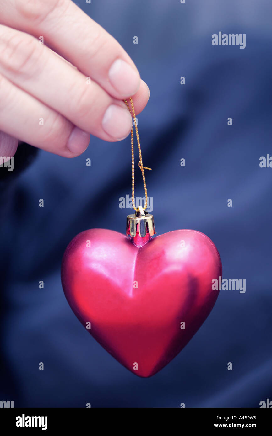 Holding symbolic objects hi-res stock photography and images - Alamy