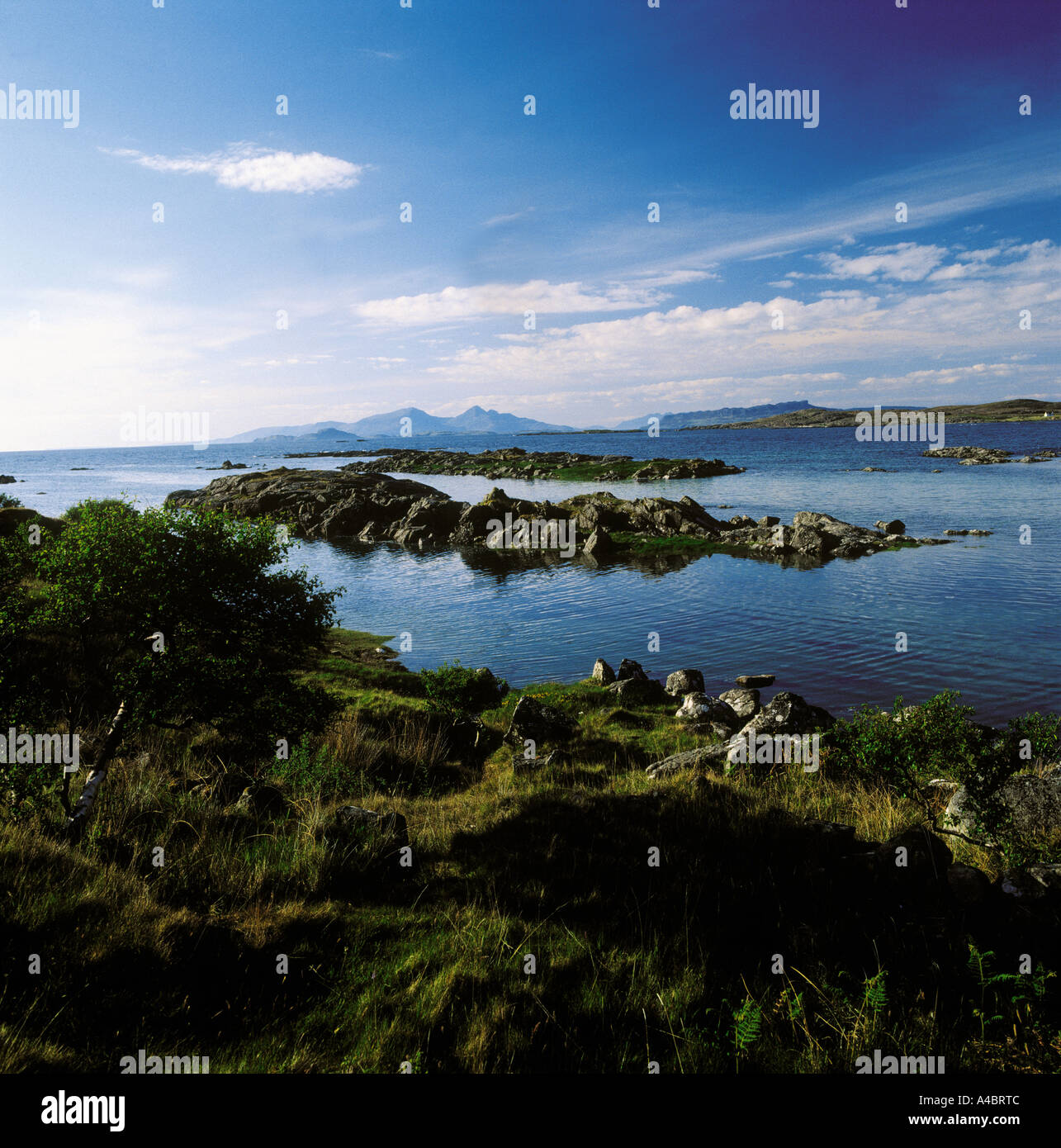 View towards the Islands of Rum and Eigg from Sanna Bay Stock Photo - Alamy