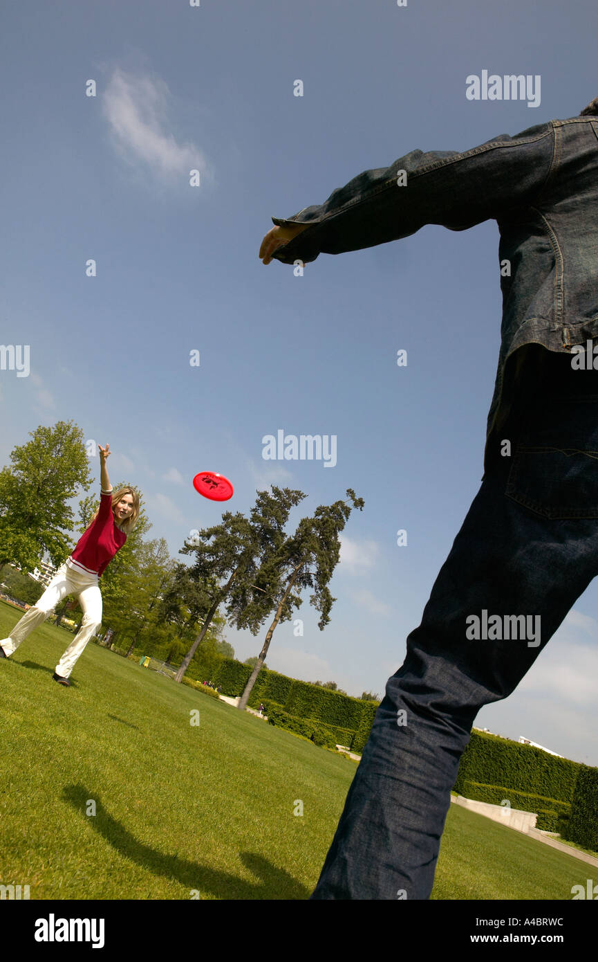 Young man standing throwing something hi-res stock photography and ...