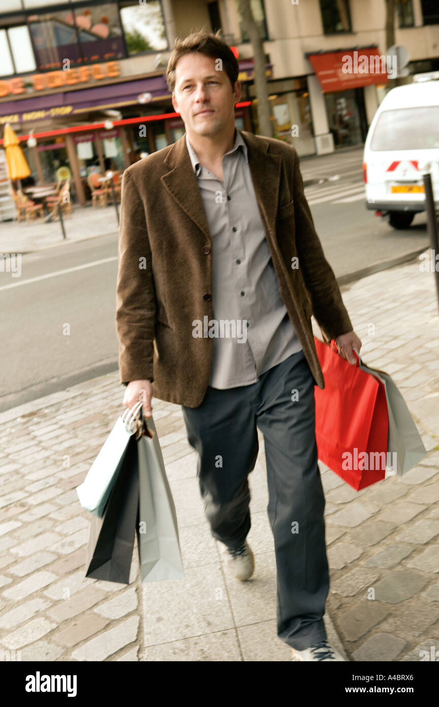Man walking out of a shop door hi-res stock photography and images - Alamy