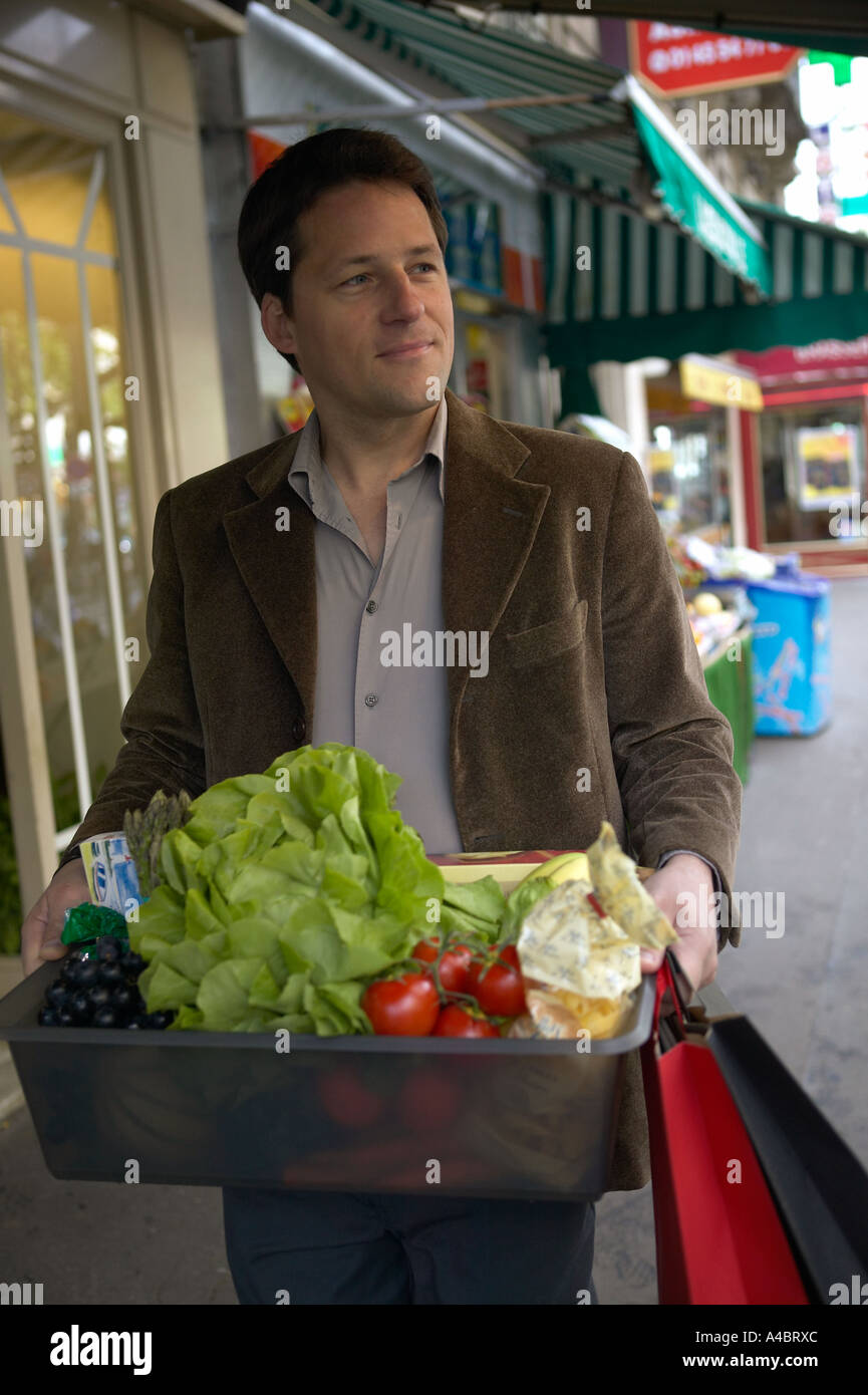Man shopping bags carrying box hi-res stock photography and images - Alamy