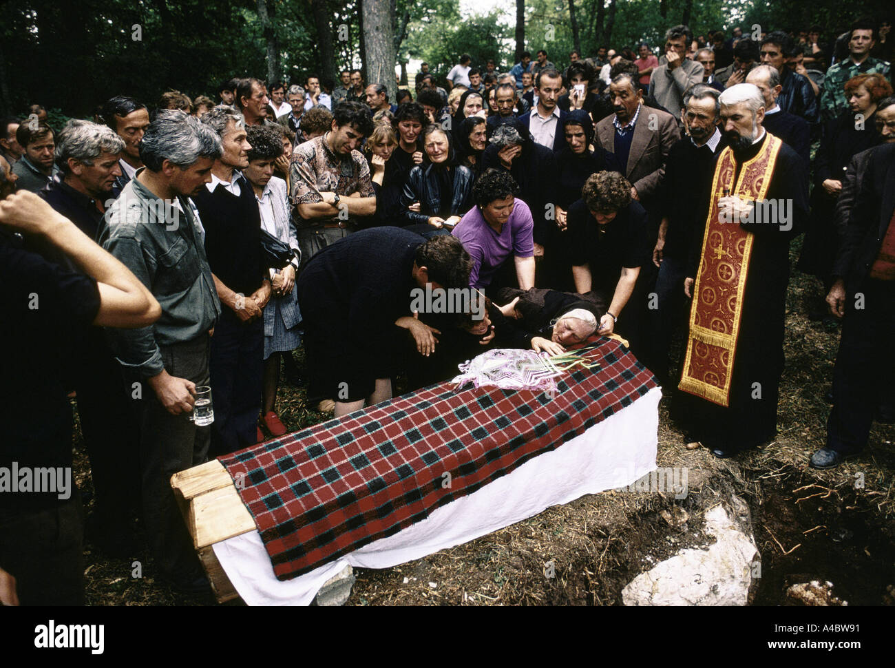 People Crying At A Military Funeral
