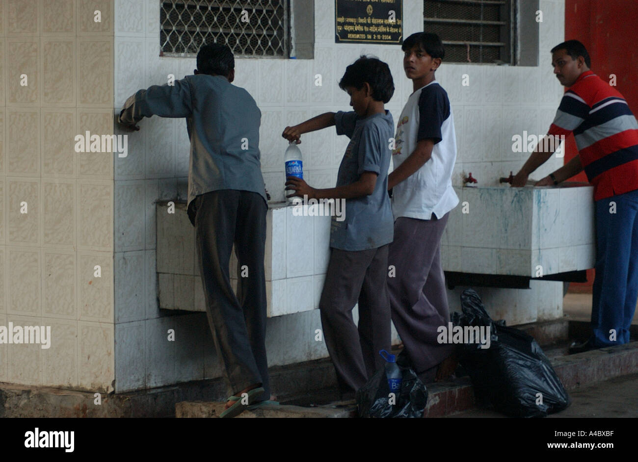 Homeless street children living and working on Bombay Central Station ...