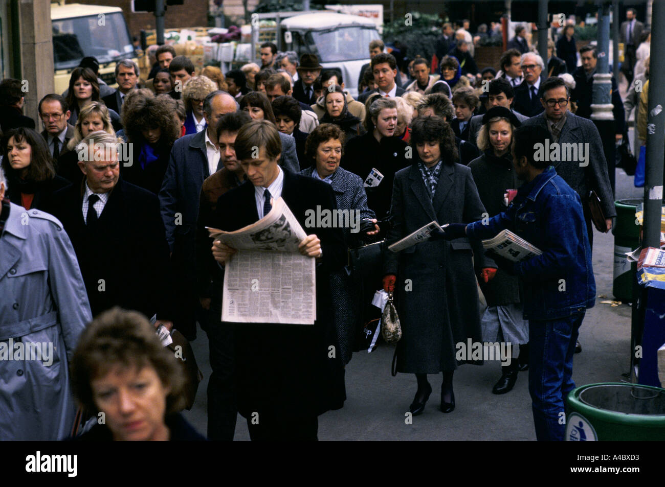 group of commuters walking around victoria area Stock Photo - Alamy