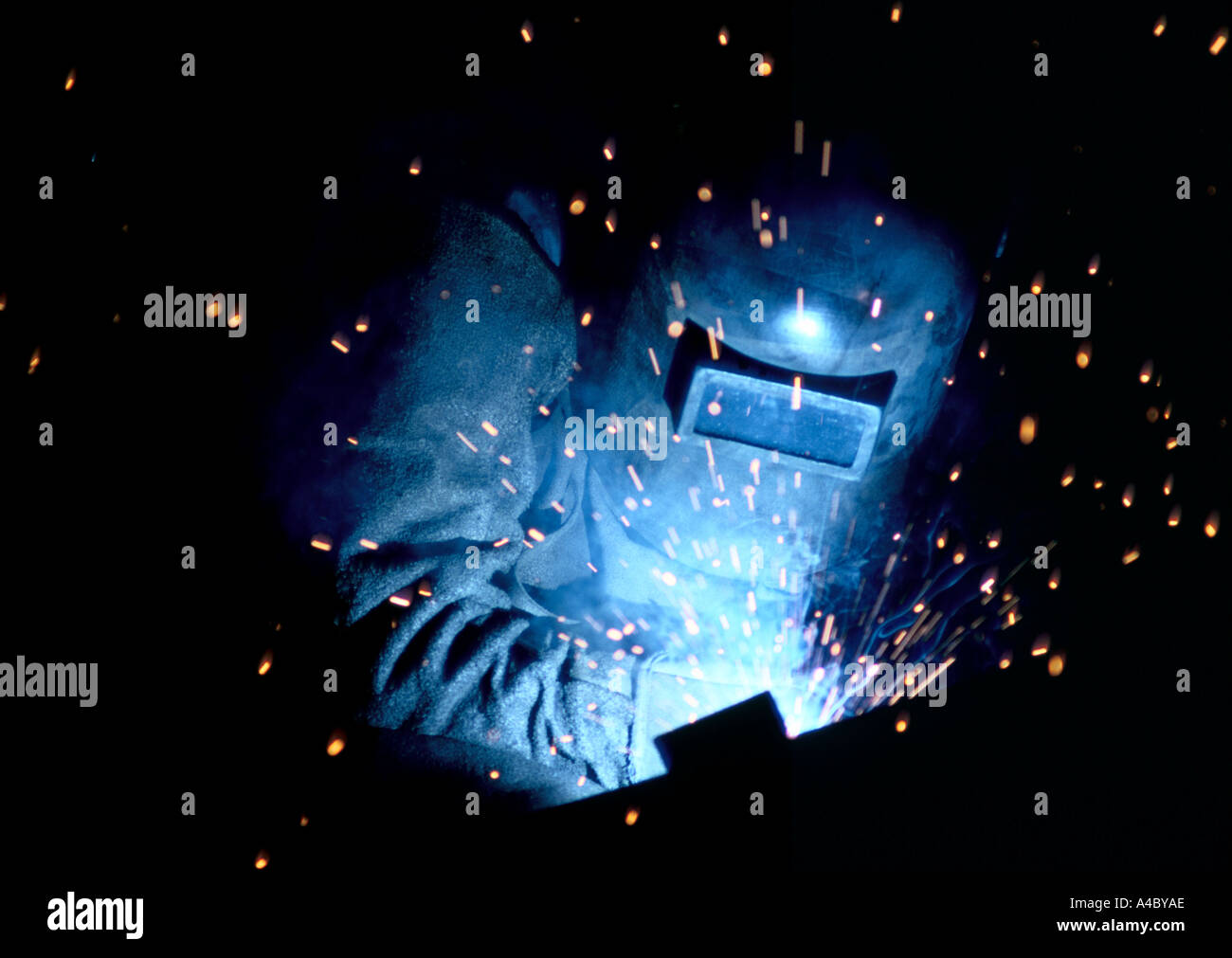 A welder on the Itaipu hydro electric dam, Paraguay, Brazil Stock Photo ...