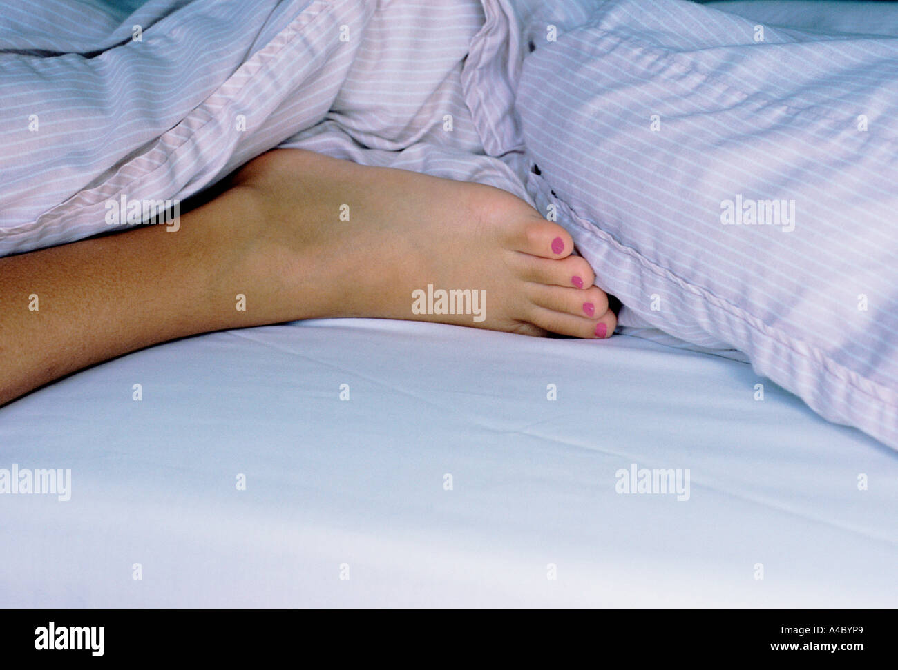 Red painted toes hi-res stock photography and images - Alamy