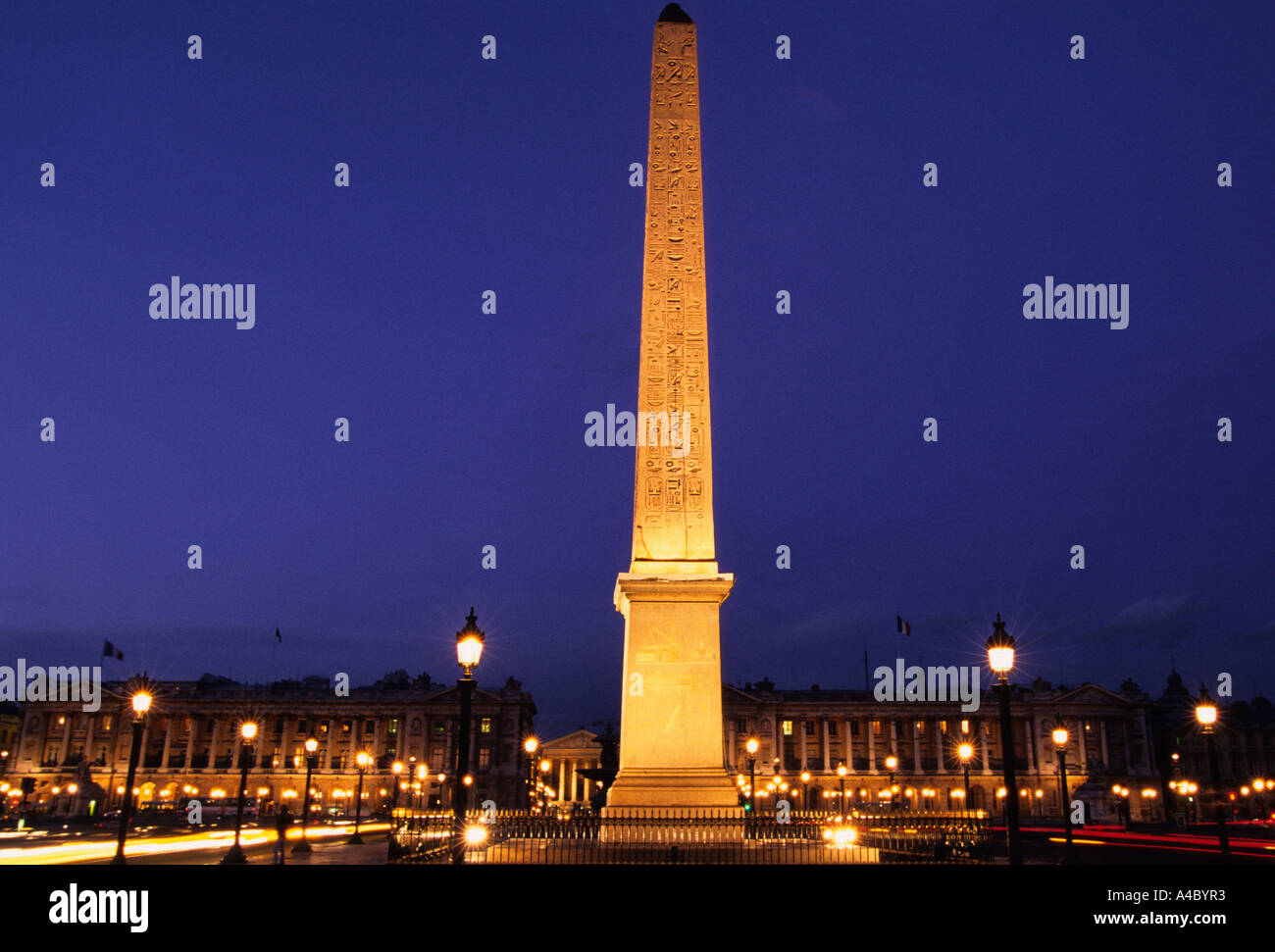 Paris Place de la Concorde Obelisk of Luxor landmarks at night. The ...