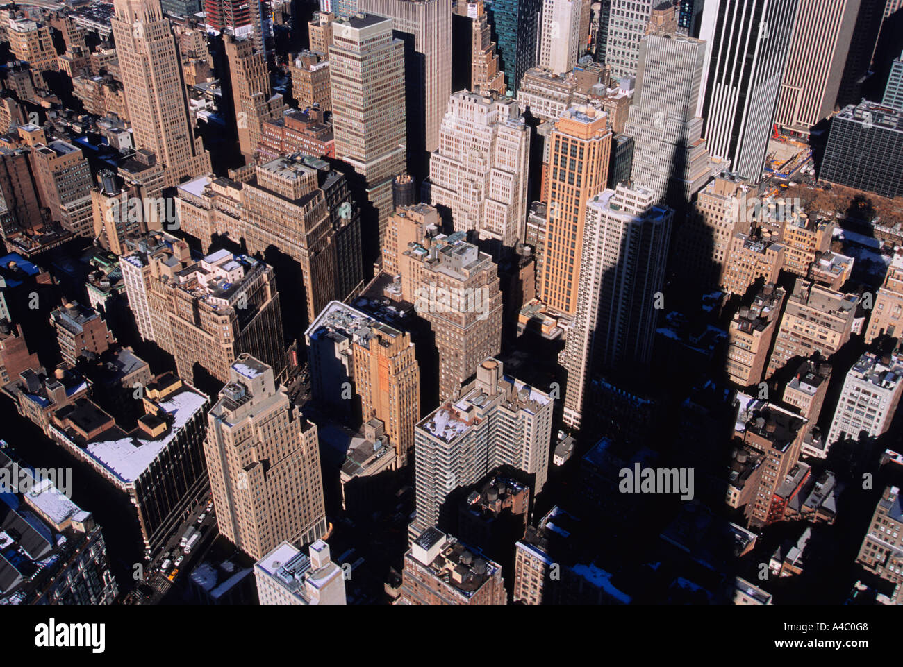 Empire State Building shadow on skyscrapers in New York City. Midtown ...