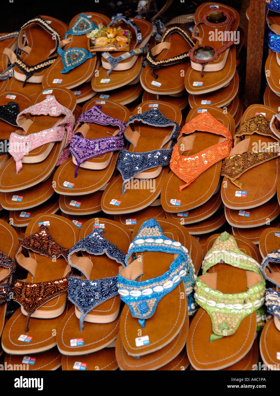 Brightly coloured sandals for sale, Ubud Street market Bali Indonesia ...